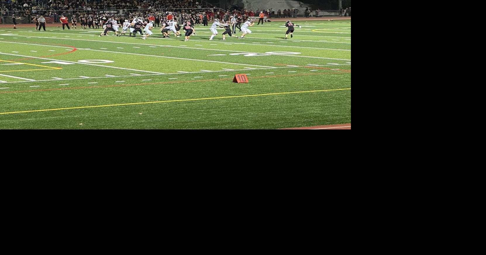 RHAM football defeats E.O. Smith 21-3 to earn its second win of the ...