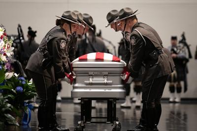 Rougeau remembered as bright light in community, 'model trooper' | News ...