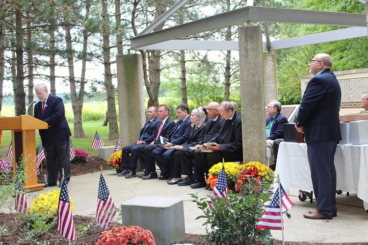 Volunteers scatter ashes of unclaimed dead at Old Almshouse Cemetery ...