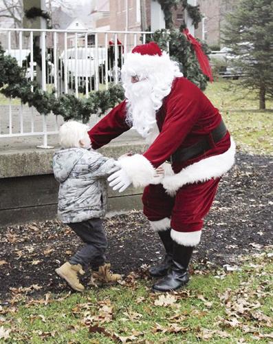 Santa brings joy and warmth to Corry children | News | thecorryjournal.com