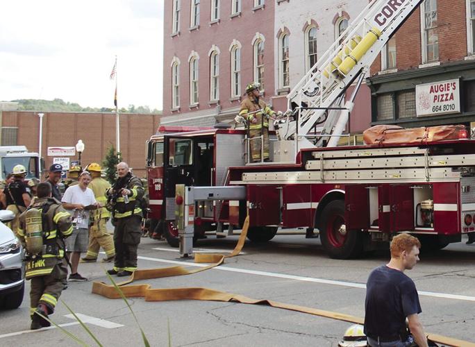 Firefighters battle blaze, save downtown building | News ...
