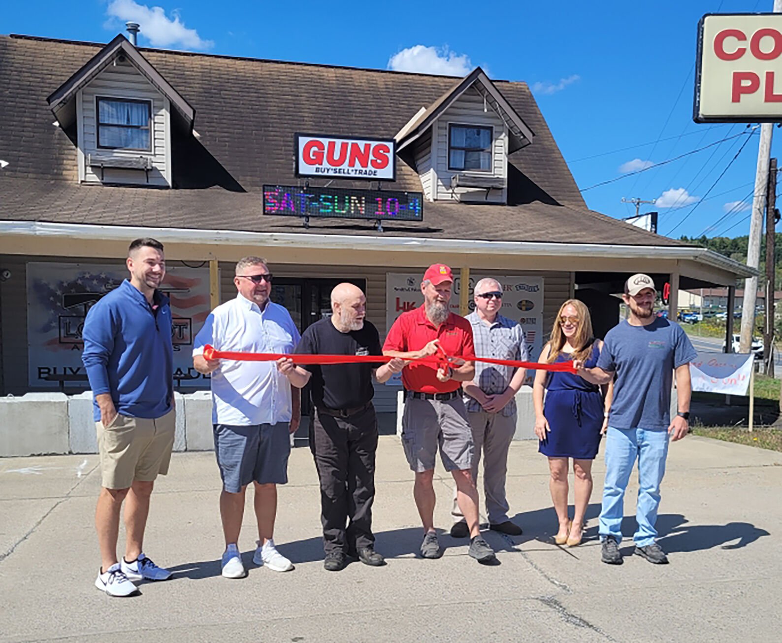 Ribbon cutting held for Long Shot Ammo & Arms | News ...