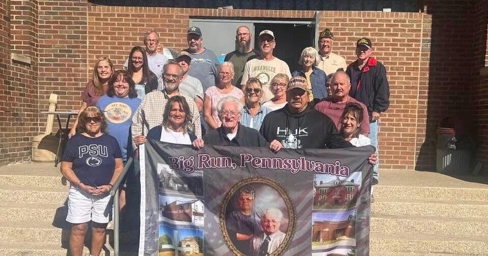 Community members in Big Run honor longtime mayor with flag | News ...