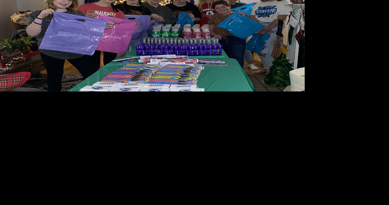 Area softball players donate care packages to DASD students in need ...