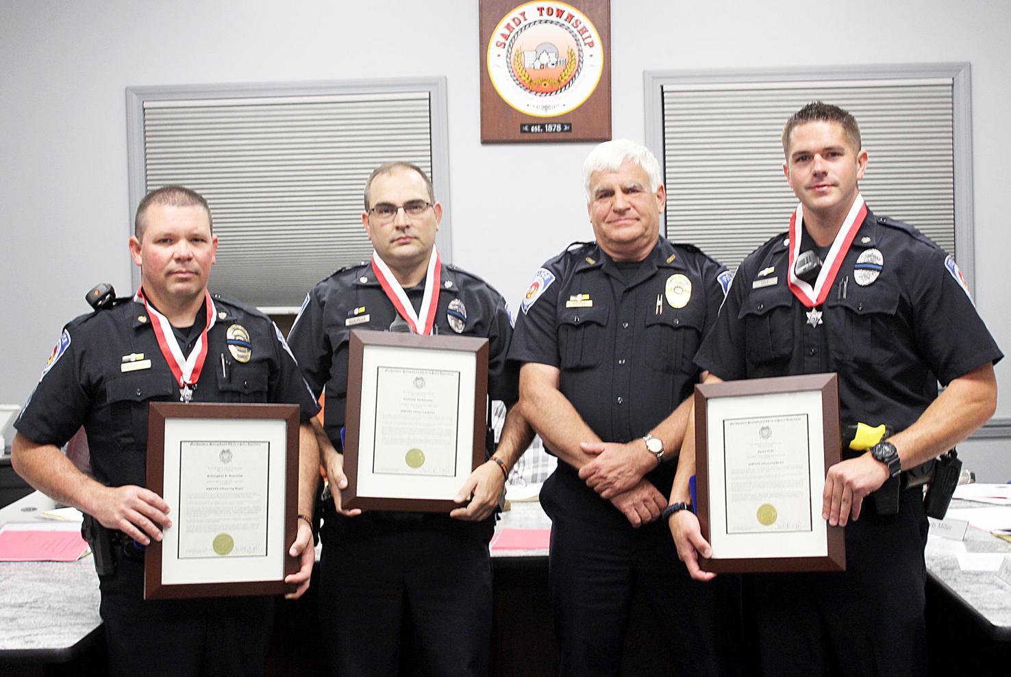 Sandy Twp. police officers receive lifesaving medals | News ...