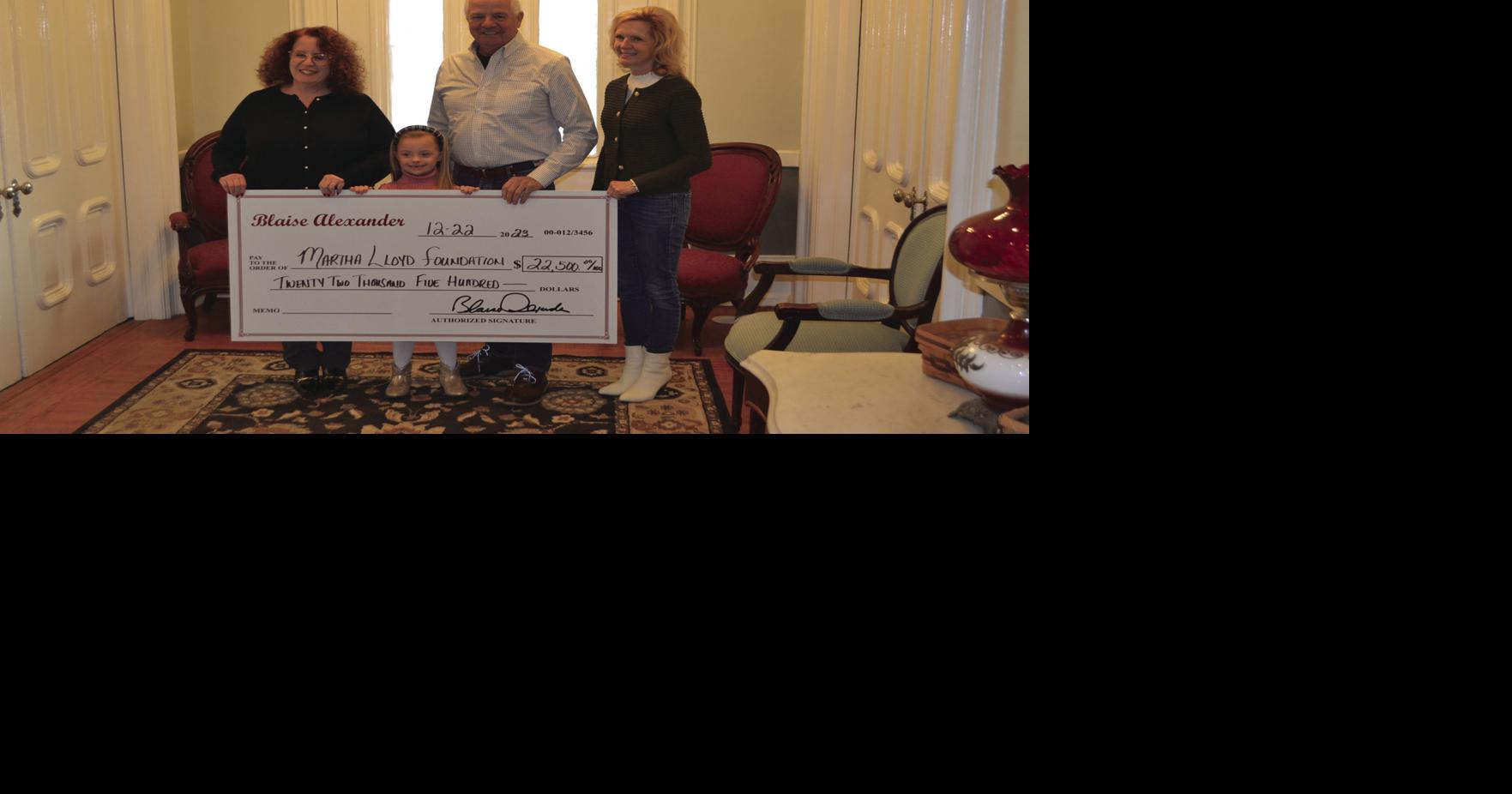Martha Lloyd receives donation from Blaise Alexander | Local/Regional ...
