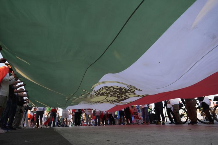 Iranian Americans protest for change outside Iran's World Cup match, in ...