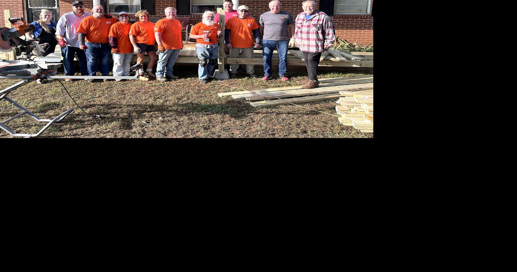Neighbor helping neighbor: Volunteers build ramp for Navy veteran ...