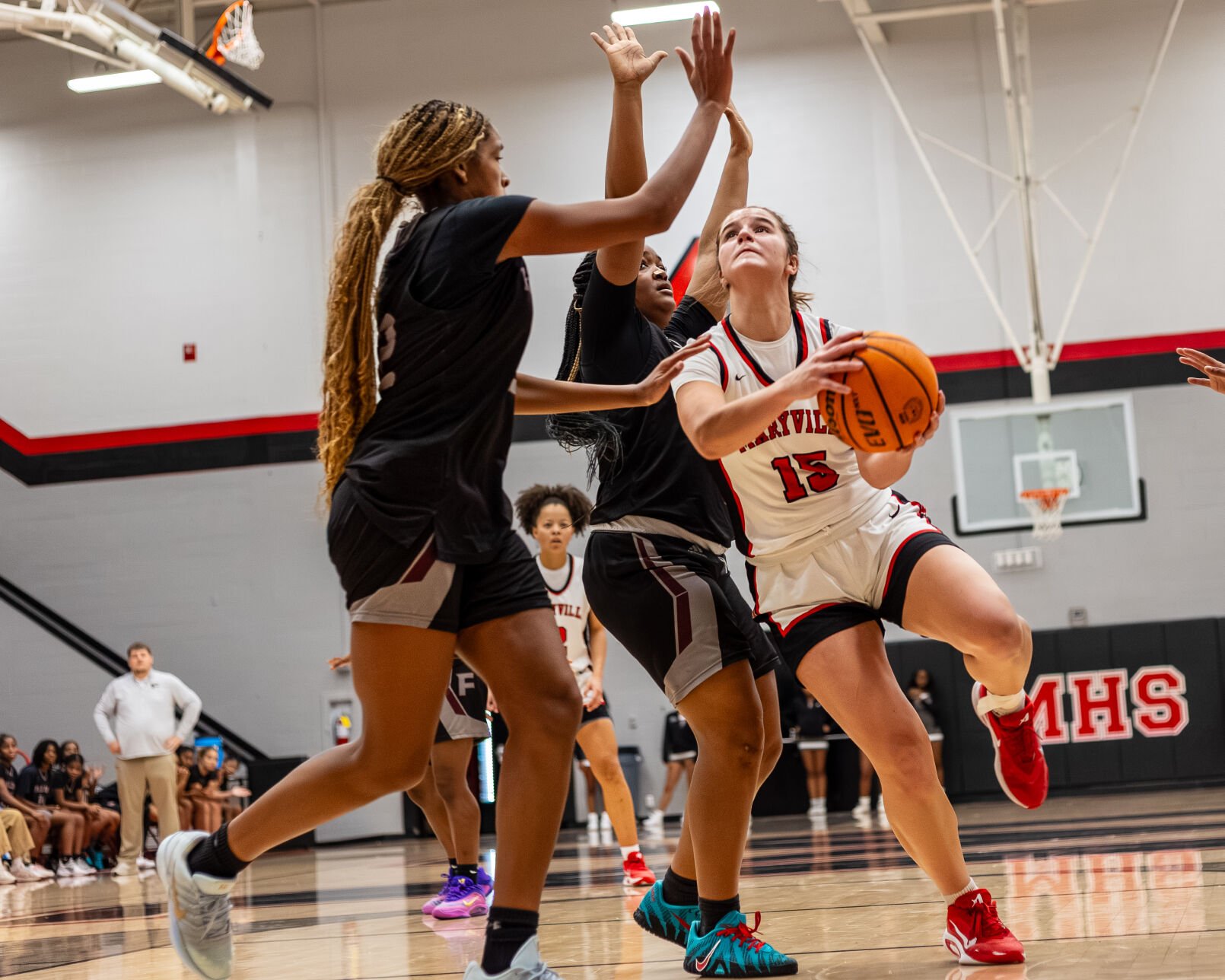 Lady Rebels overcome slow start, pick up first district win over ...