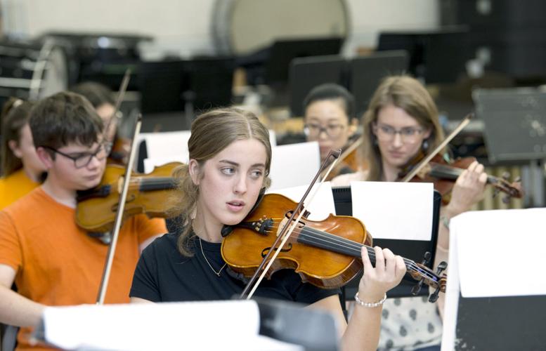 Maryville High School orchestra students playing side-by-side Friday ...