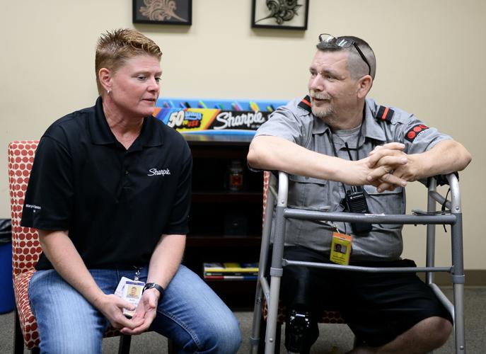 That's what friends are for; Security guard embraced by Newell ...