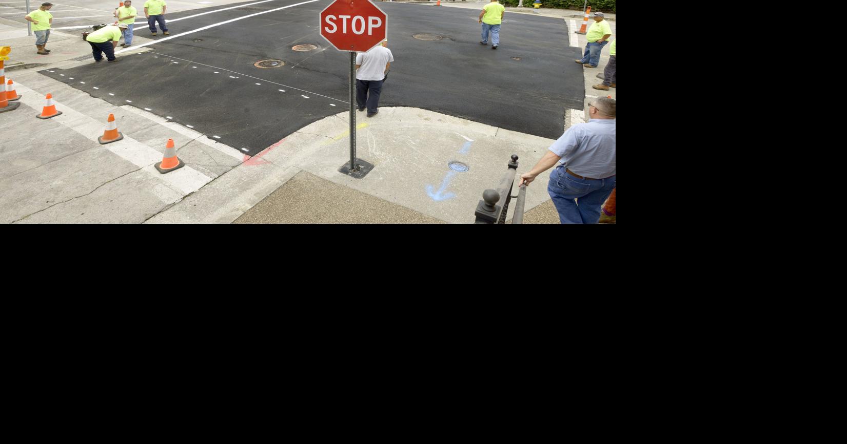 Paving the day: East Harper Avenue section reopens after one of city's ...
