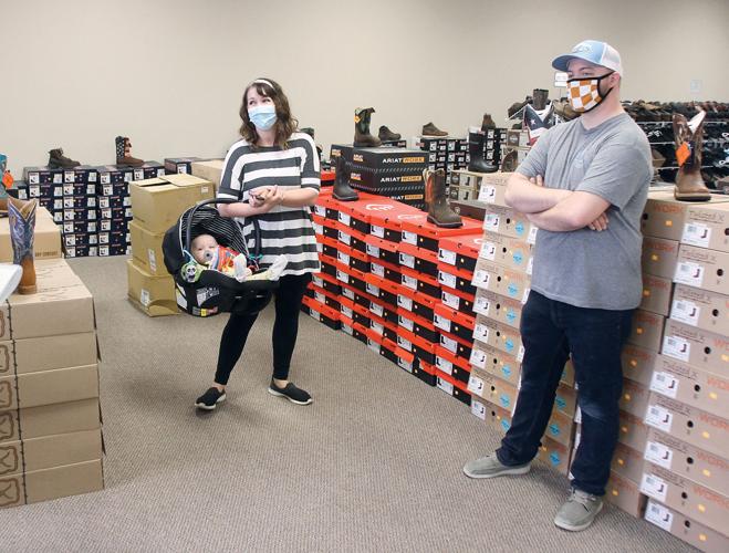 Step in right direction; Young couple opens large shoe store in ...