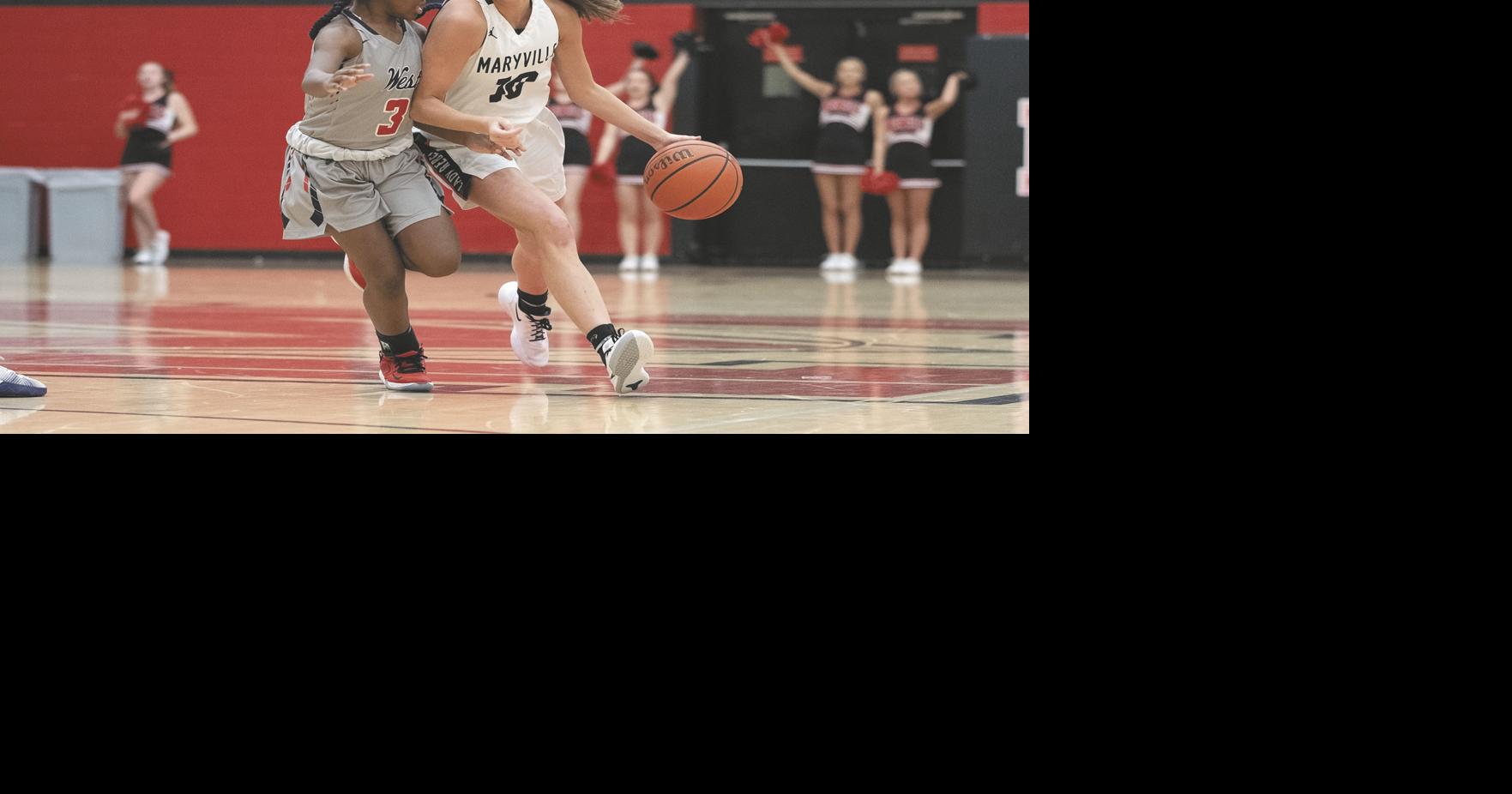 Football players add spark to Maryville in latest basketball victory ...