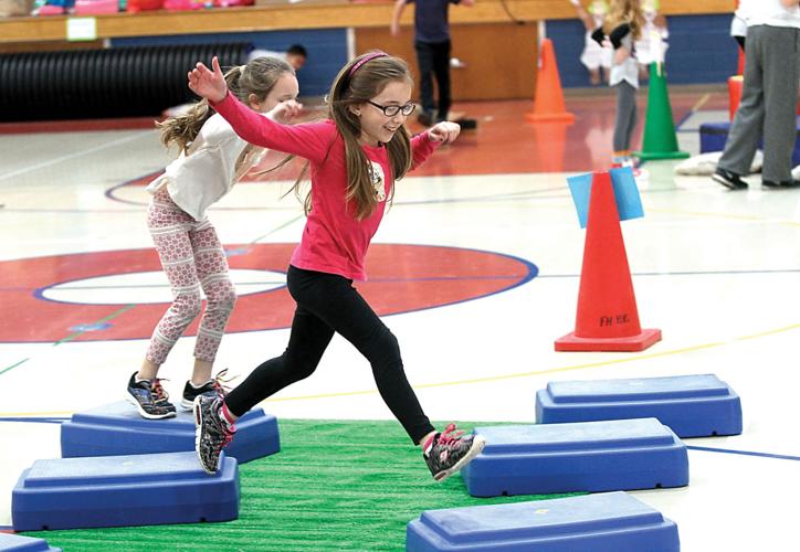 Foothills Elementary School students navigate One Book Blitz obstacle ...