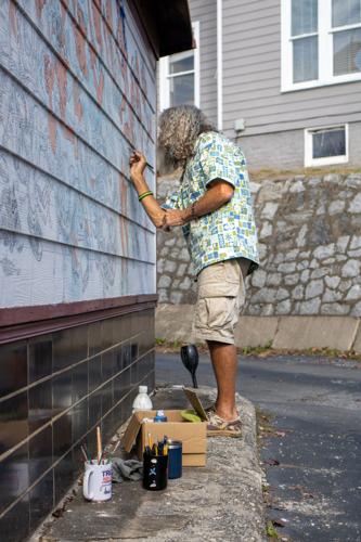 Artist Michael Alexi adds another mural to downtown comic store, The ...