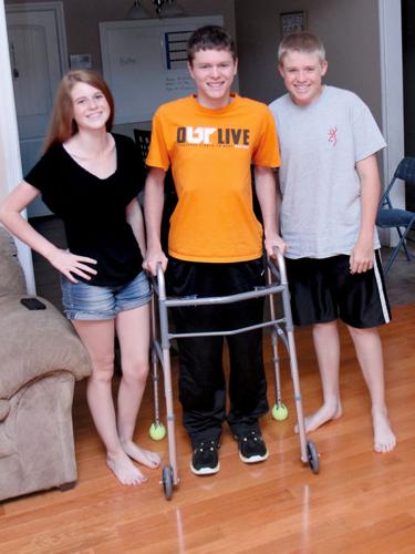 Crowd erupts as MHS graduate Nathan Odom walks across stage | Community ...