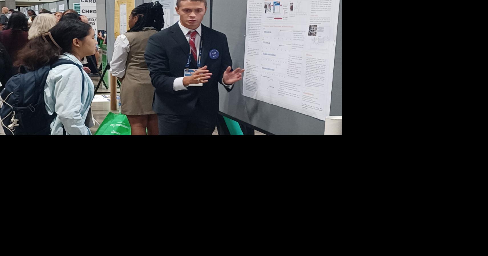 VMI cadet Charles McLaughlin, of Maryville, presents research to ...