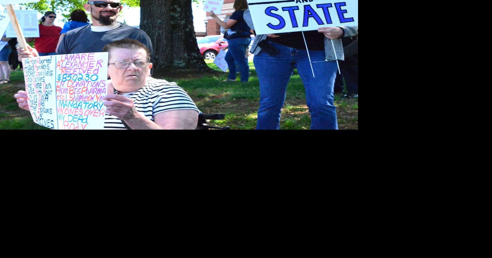 Anti-vaxxers protest Alexander's support for mandatory vaccines | News ...