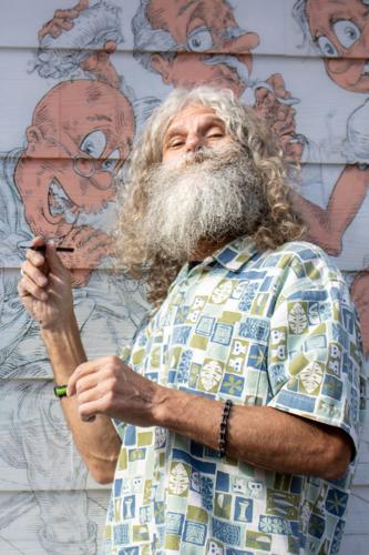 Artist Michael Alexi adds another mural to downtown comic store, The ...