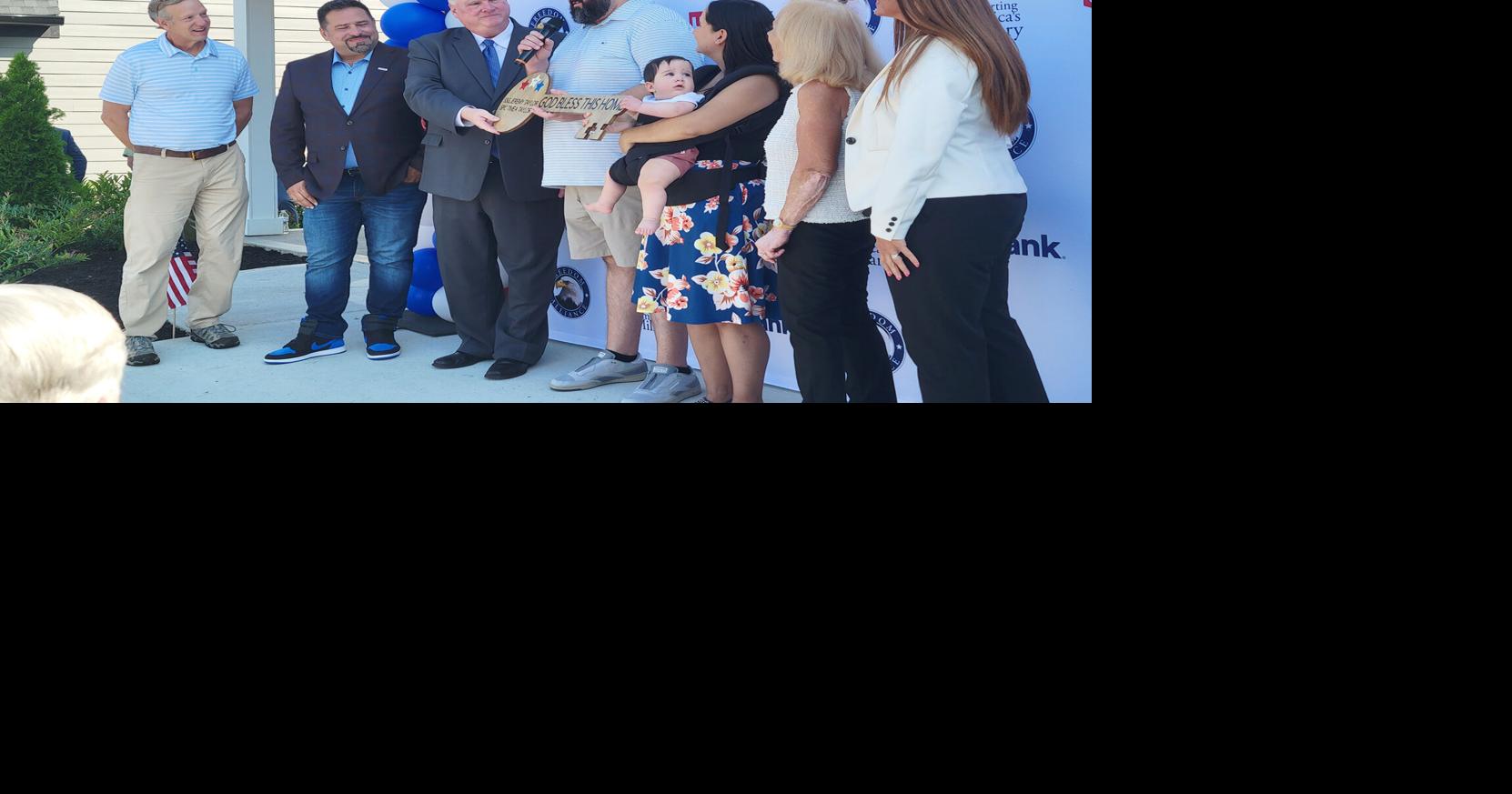 A house becomes home: Army veterans handed keys to new life | News ...