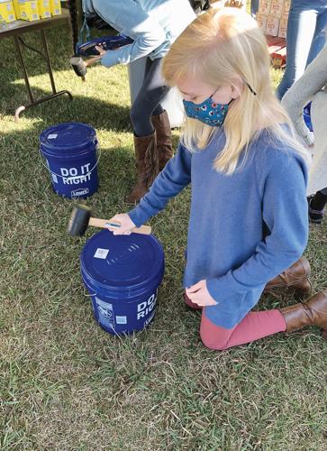 Serving on the mission field; Fairview packs buckets of food for ...