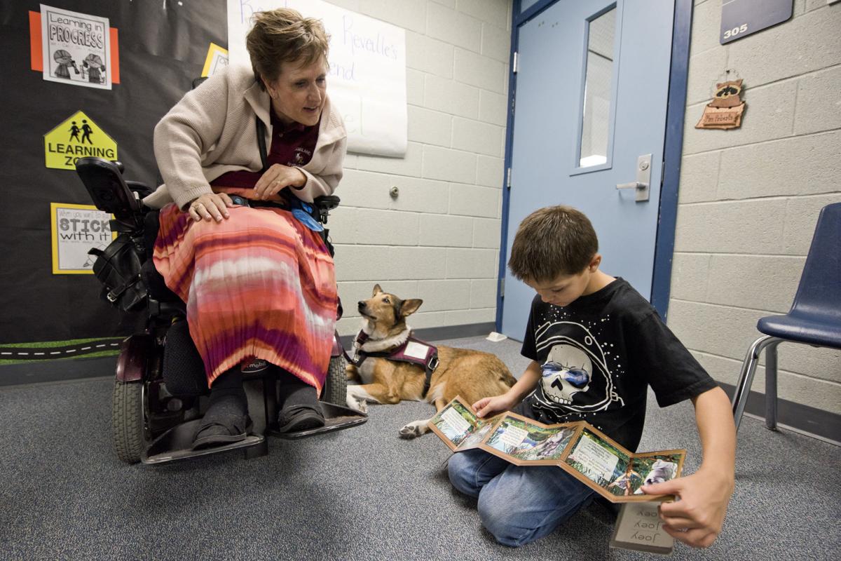 Sul Ross students read with service dogs