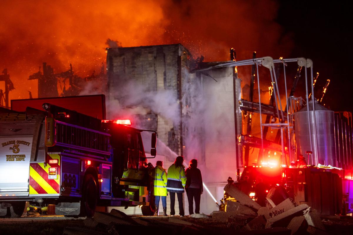 Feather Crest Farm fire still smoldering