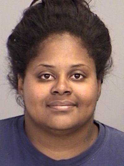 Police: Woman fleeing scene of theft put children in danger