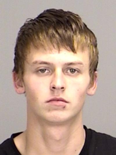 Teen arrested after allegedly aiming gun at girlfriend, roommate