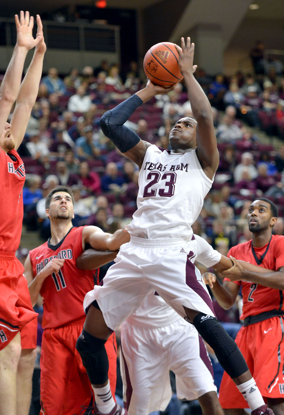 Aggie men's basketball team holds off Hartford with late run | Mens ...
