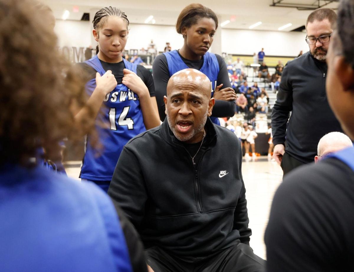Former Bryan boys basketball coach John Reese wins 6A state