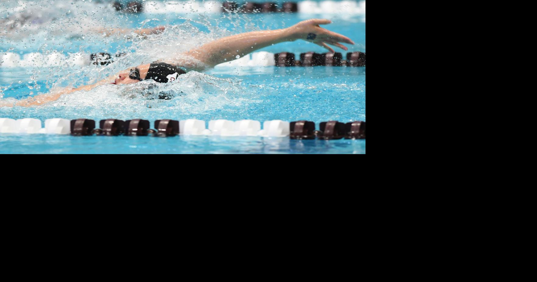 A&M Consolidated swimming and diving team splits matches with Houston HCYA