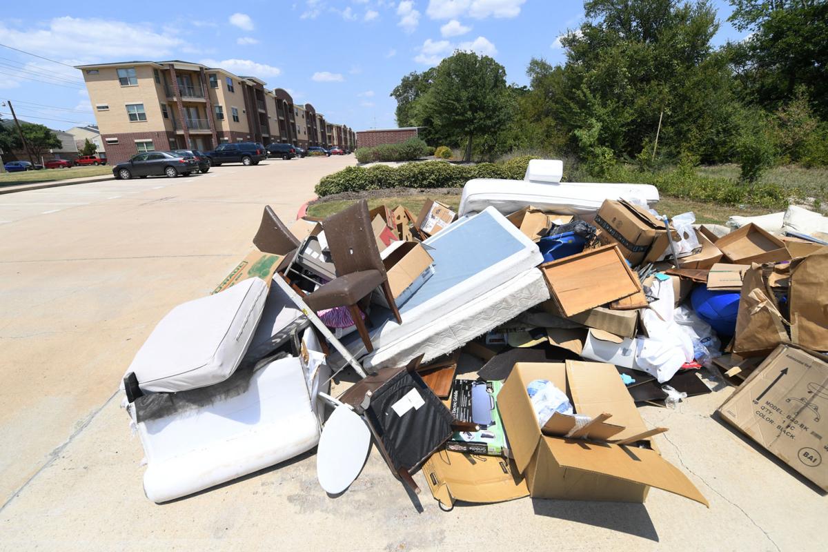 Student move-out trash clutters curbs in Aggieland