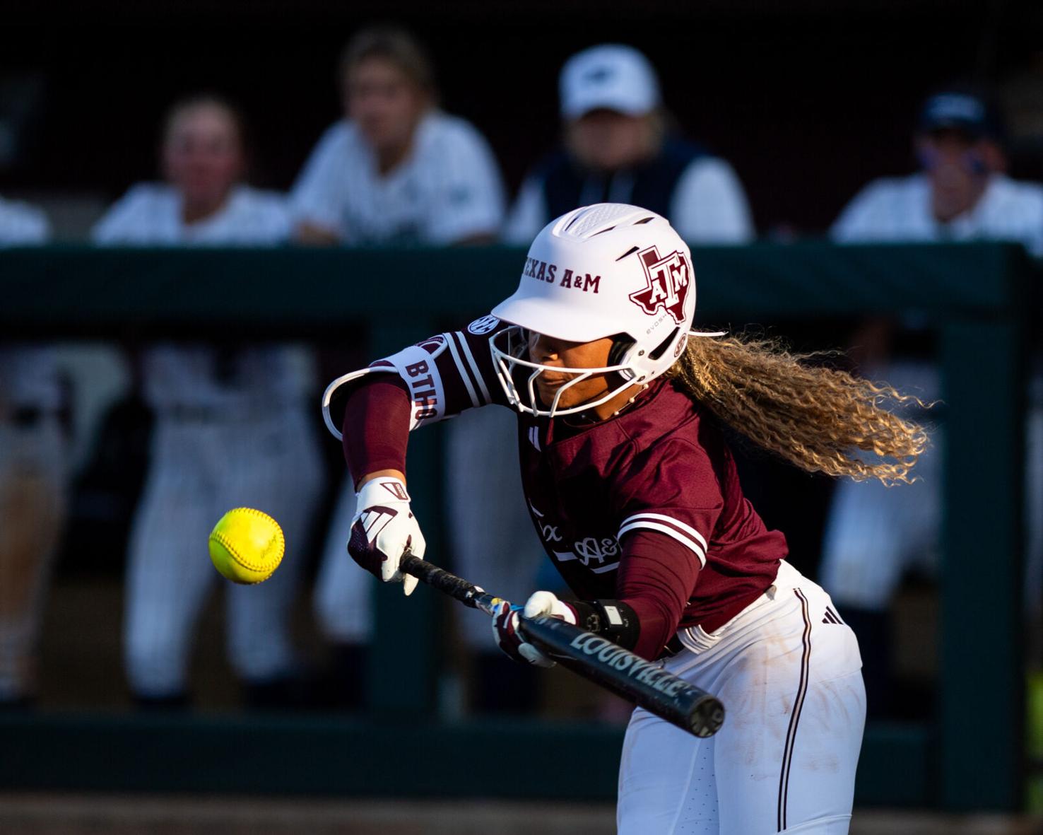 A&M softball's bats come alive late in season opener