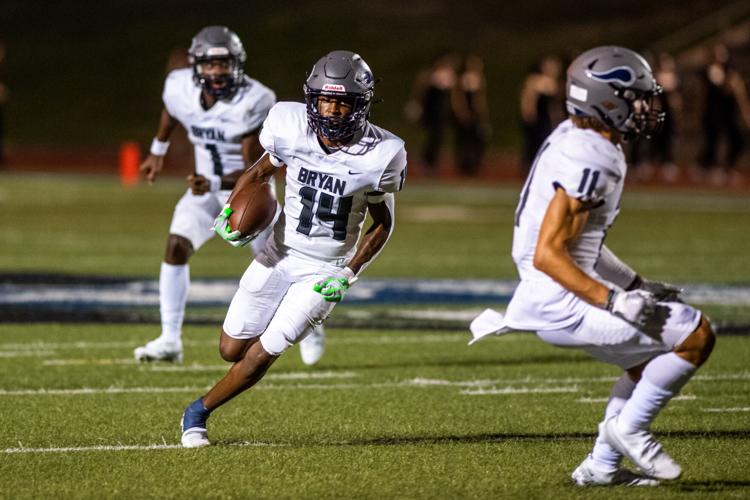 Gooden, Lewis lead Bryan to 67-21 victory over Waller in Tullos' first game