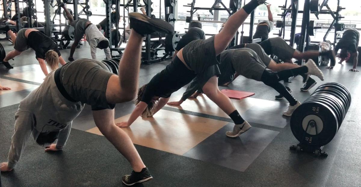 College Station football team embraces yoga as part of weekly routine