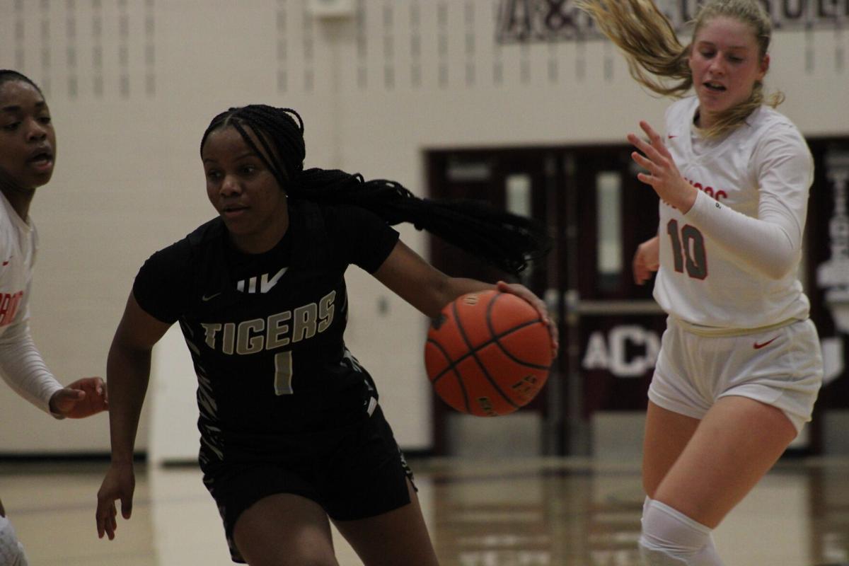 A&M Consolidated girls hang on for win over Lake Belton