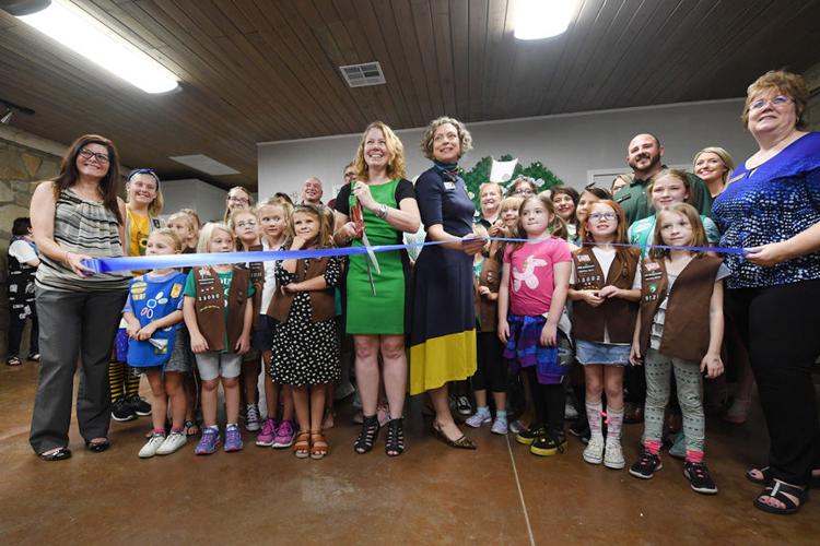 Ribbon cutting offers first official look at updated Girl Scout House ...