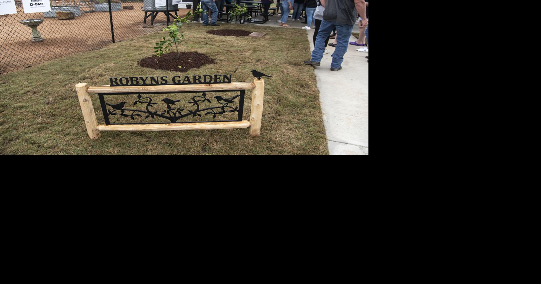 Robyn Peltier’s family, community, cut the ribbon to open Robyn’s ...