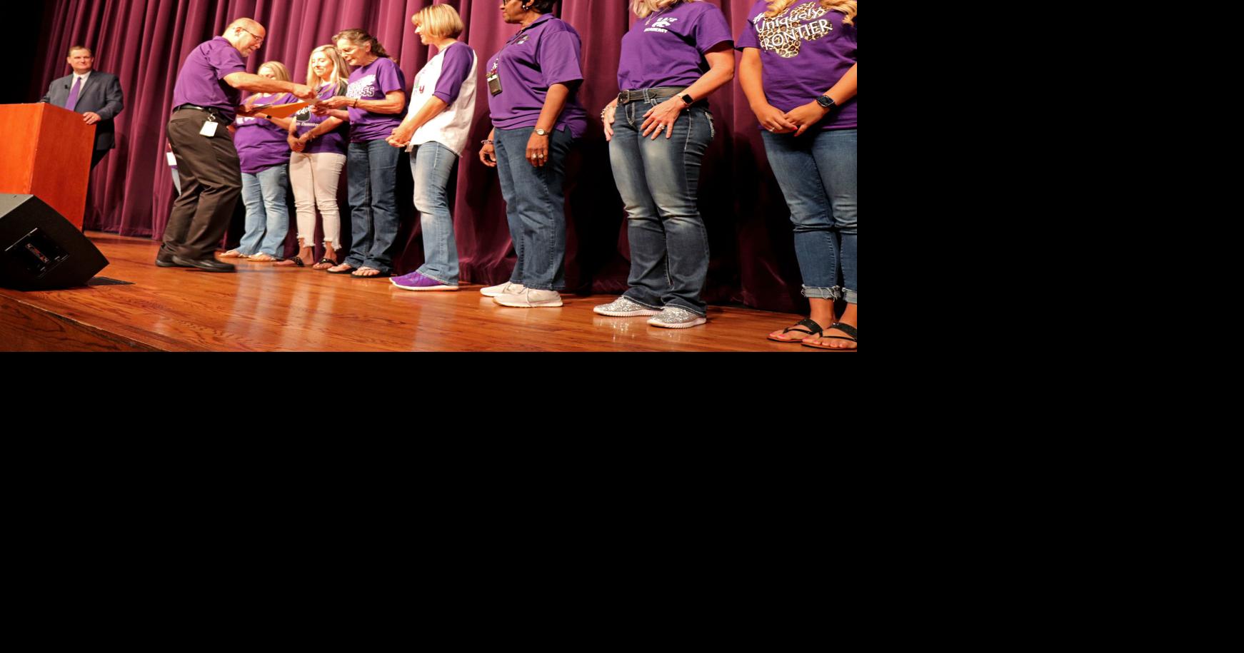 Teachers get checks for high performance at Angleton ISD convocation ...