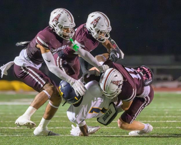 ’Necks earn win No. 500; share of district title with victory over La ...