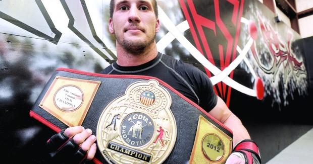 A FIGHTER'S SPIRIT: Powell juggles life, MMA career as he gains ...