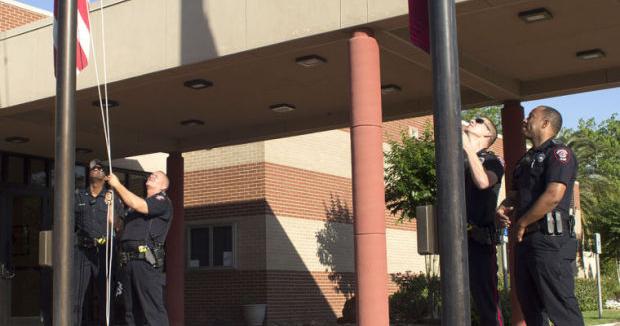 Clute residents celebrate Police Memorial Day in flag-lowering ceremony ...