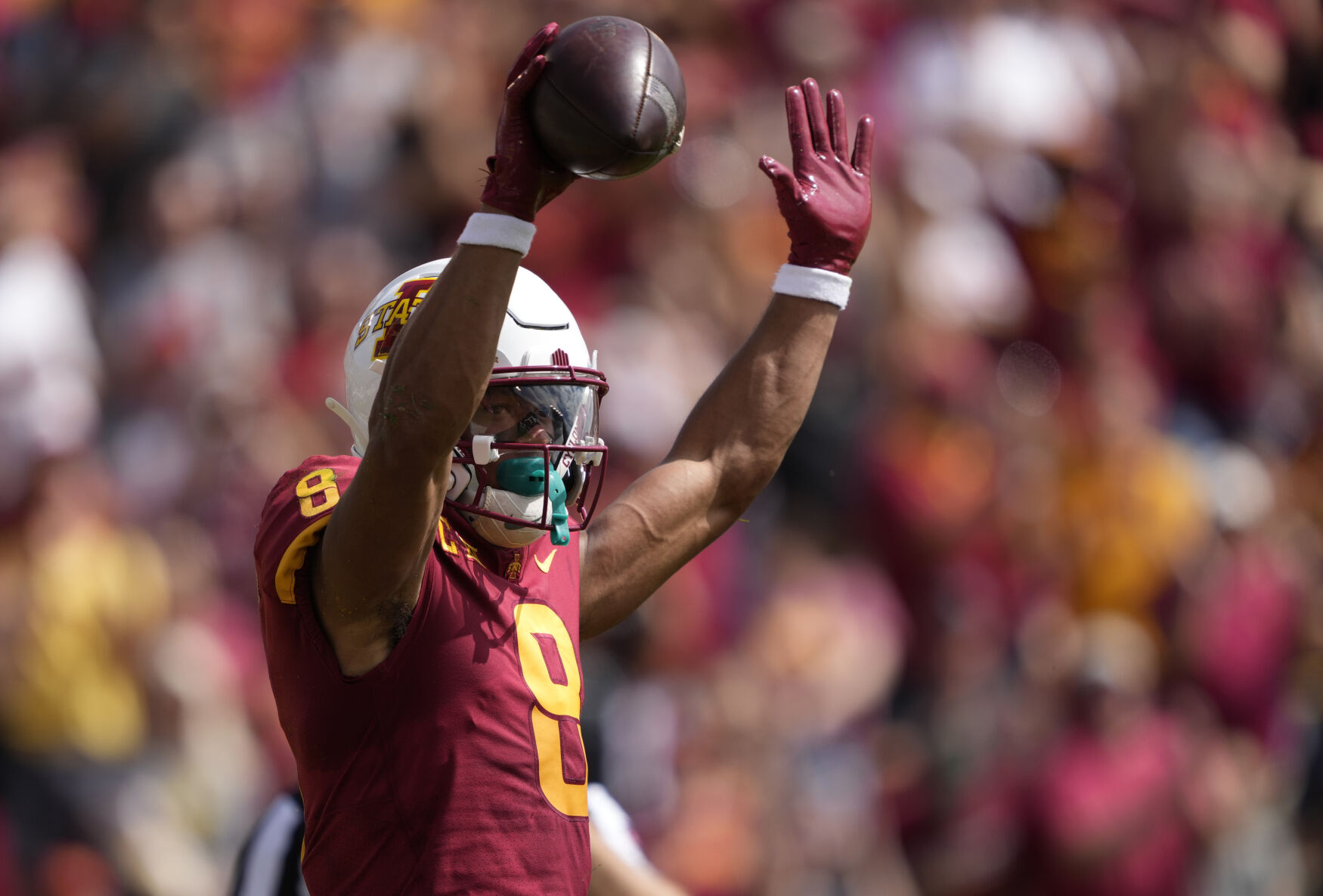 Record-breaking receiver Xavier Hutchinson enters Iowa State home ...