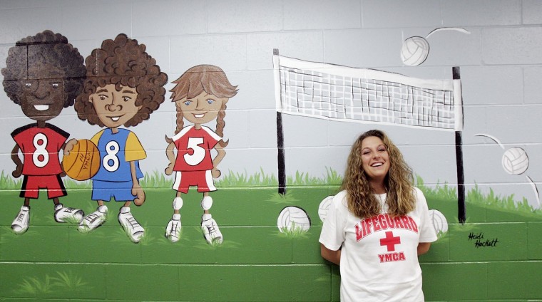 G.I. mom finds new outlet in painting YMCA murals