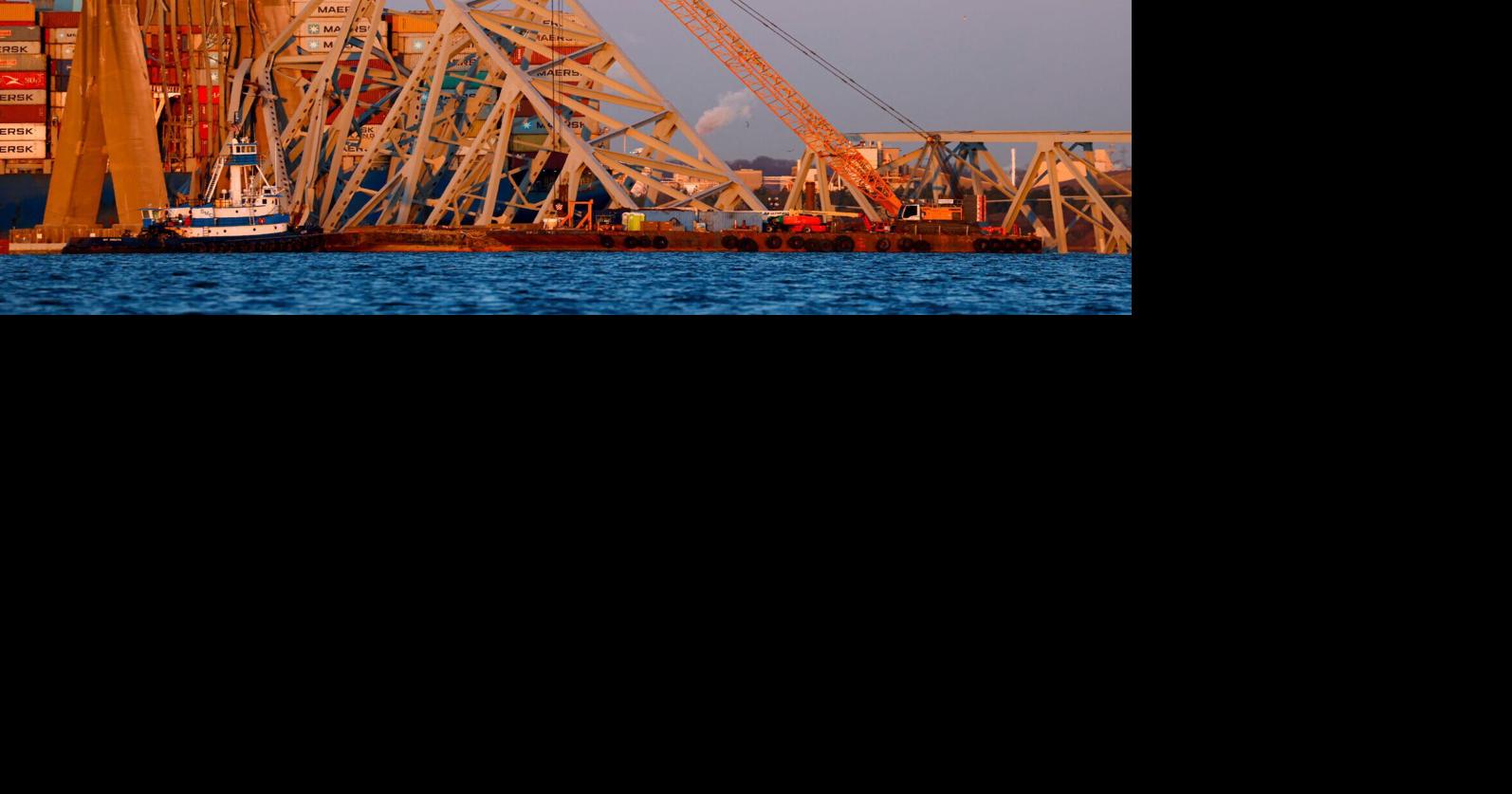 Crews carefully start removing collapsed bridge