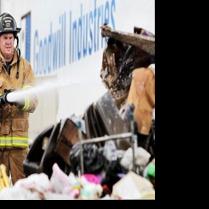 Trash compactor fire does minimal damage