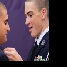 Dendinger, retired Air Force major general, participates in ROTC ceremony