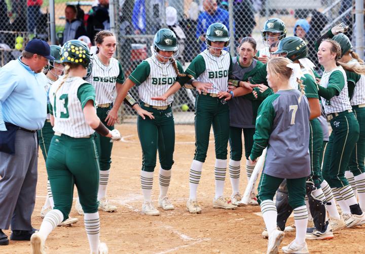 Central City splits on first day of state softball